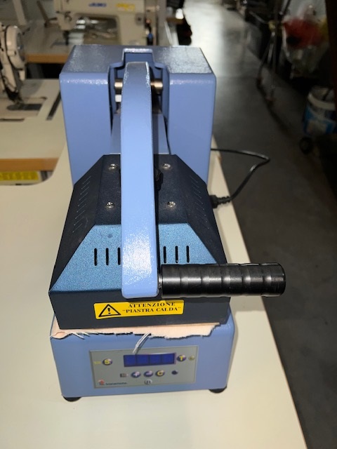 Used ironing equipment : TRANSMATIC TMH-10
